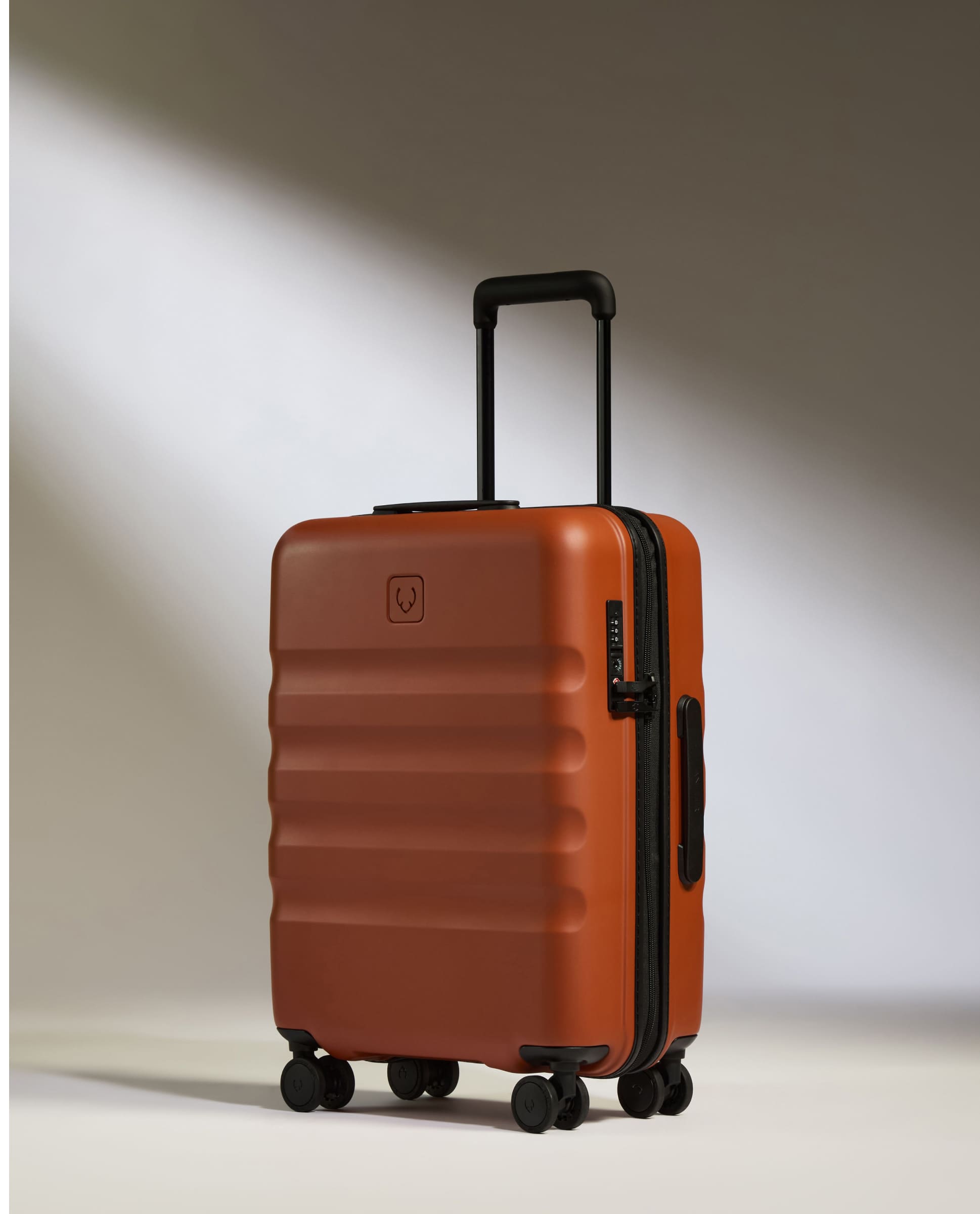 Small lightweight suitcase on wheels store