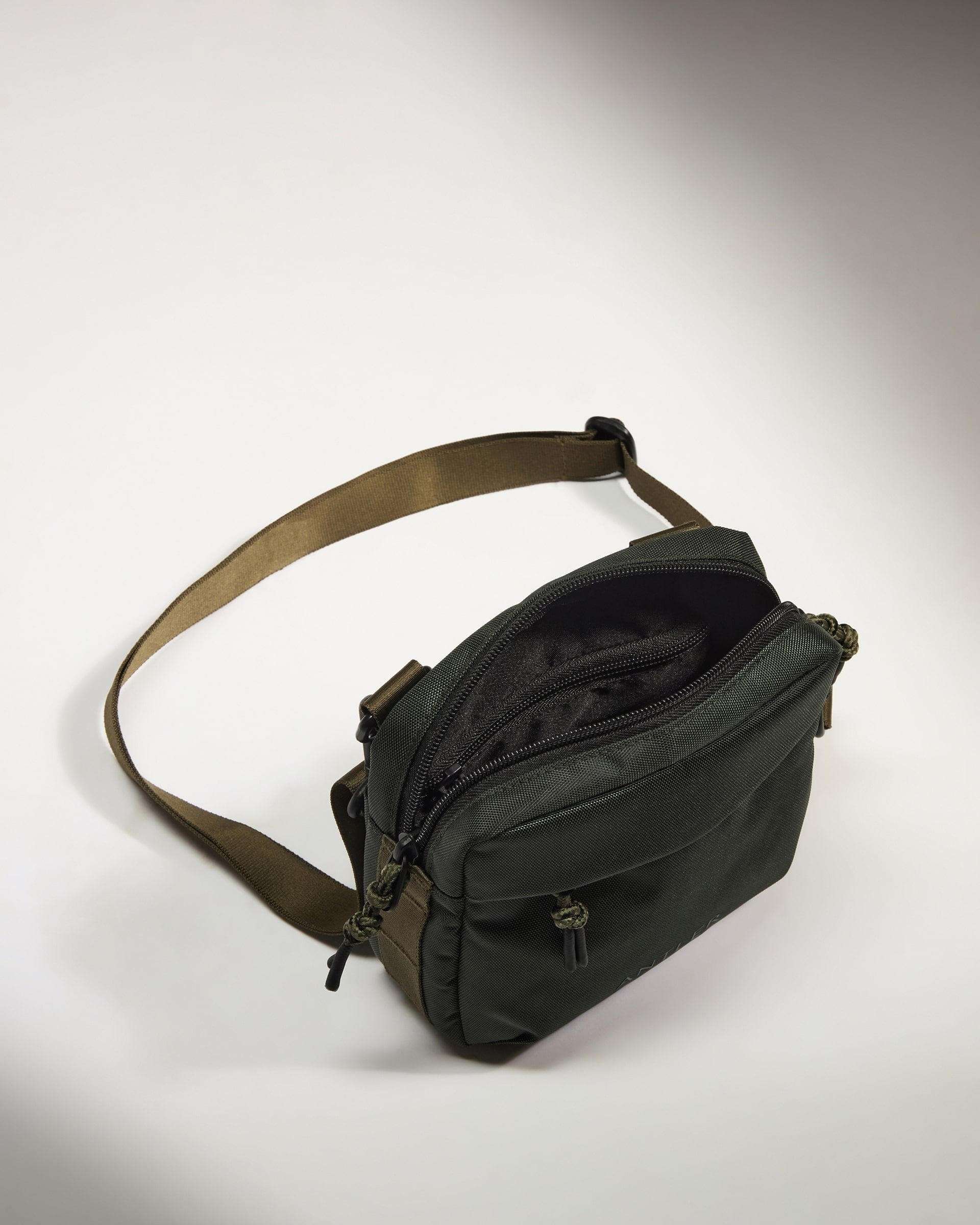 Discovery Crossbody Bag in Dark Green | Travel Bags & Accessories ...