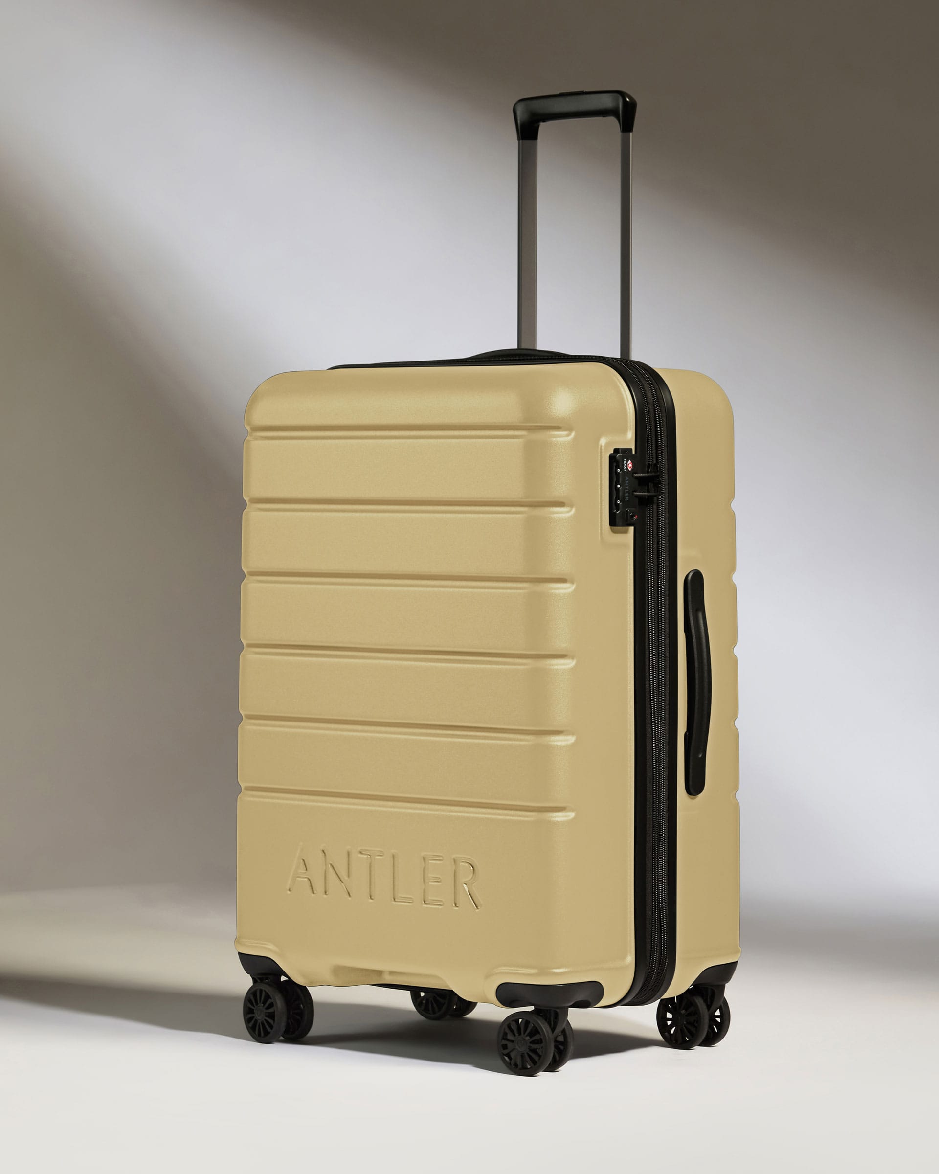 Medium Suitcase Yellow - Logo | Lightweight Hard Shell Luggage – Antler UK