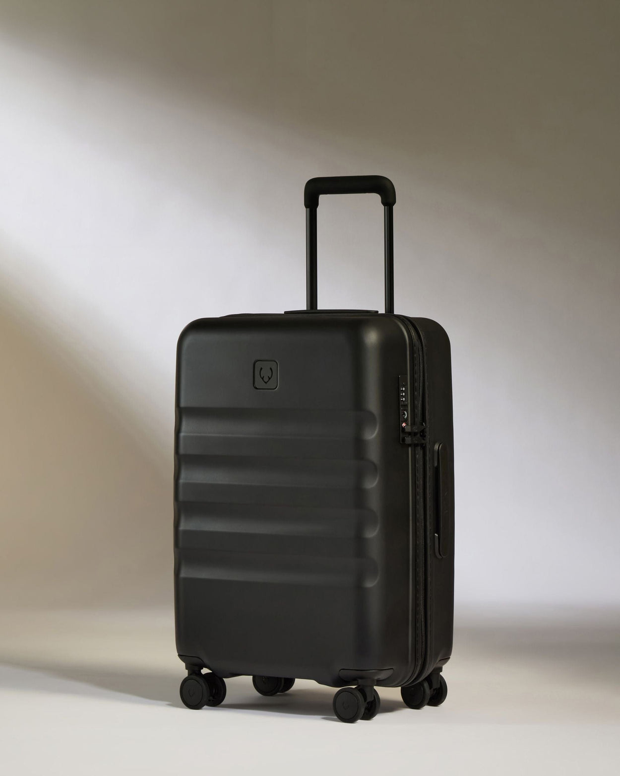 Large Cabin Suitcase in Black - Icon Stripe | Lightweight & Hard Shell ...