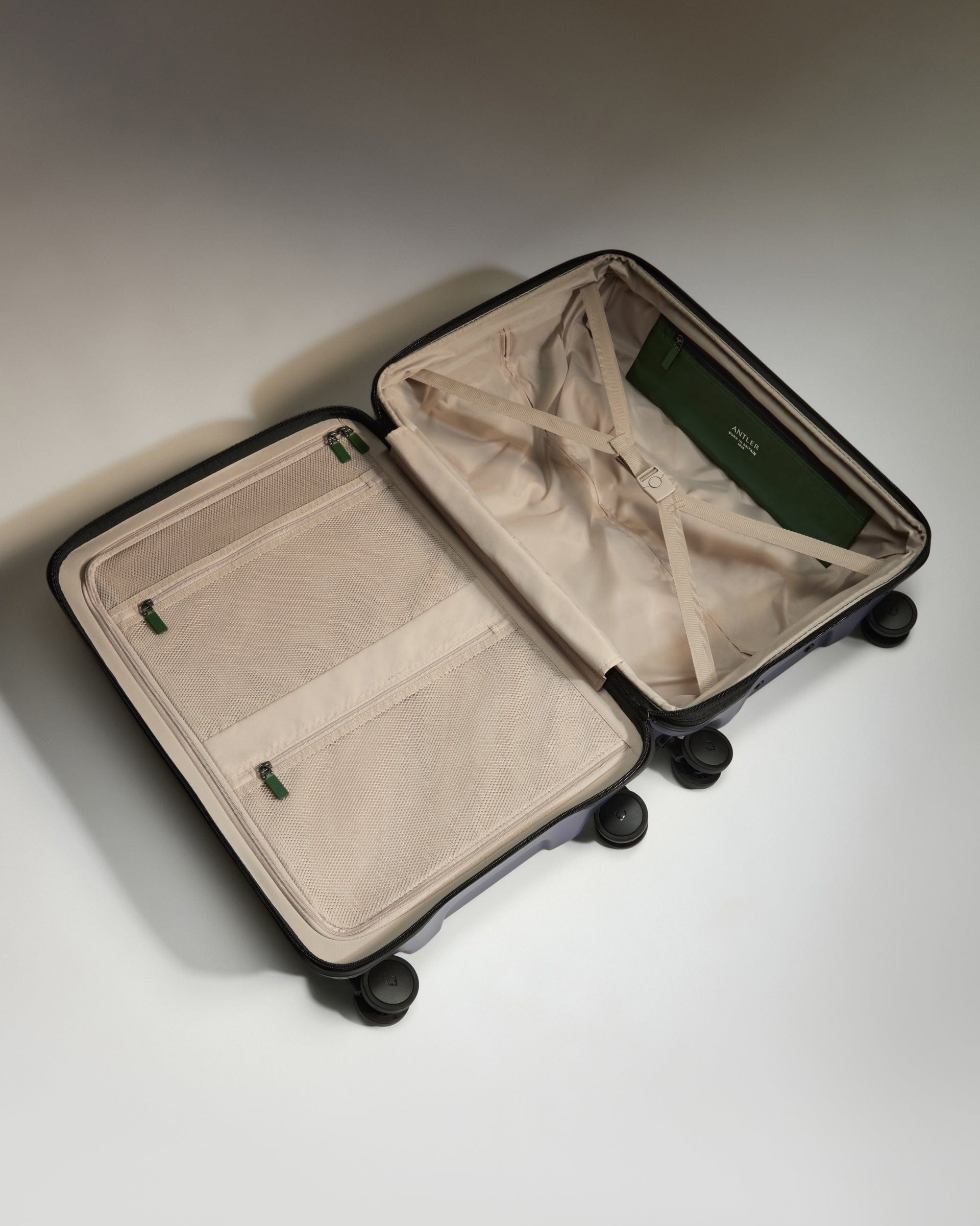 Medium suitcase in Navy - Icon Stripe | Lightweight & Hard Shell ...