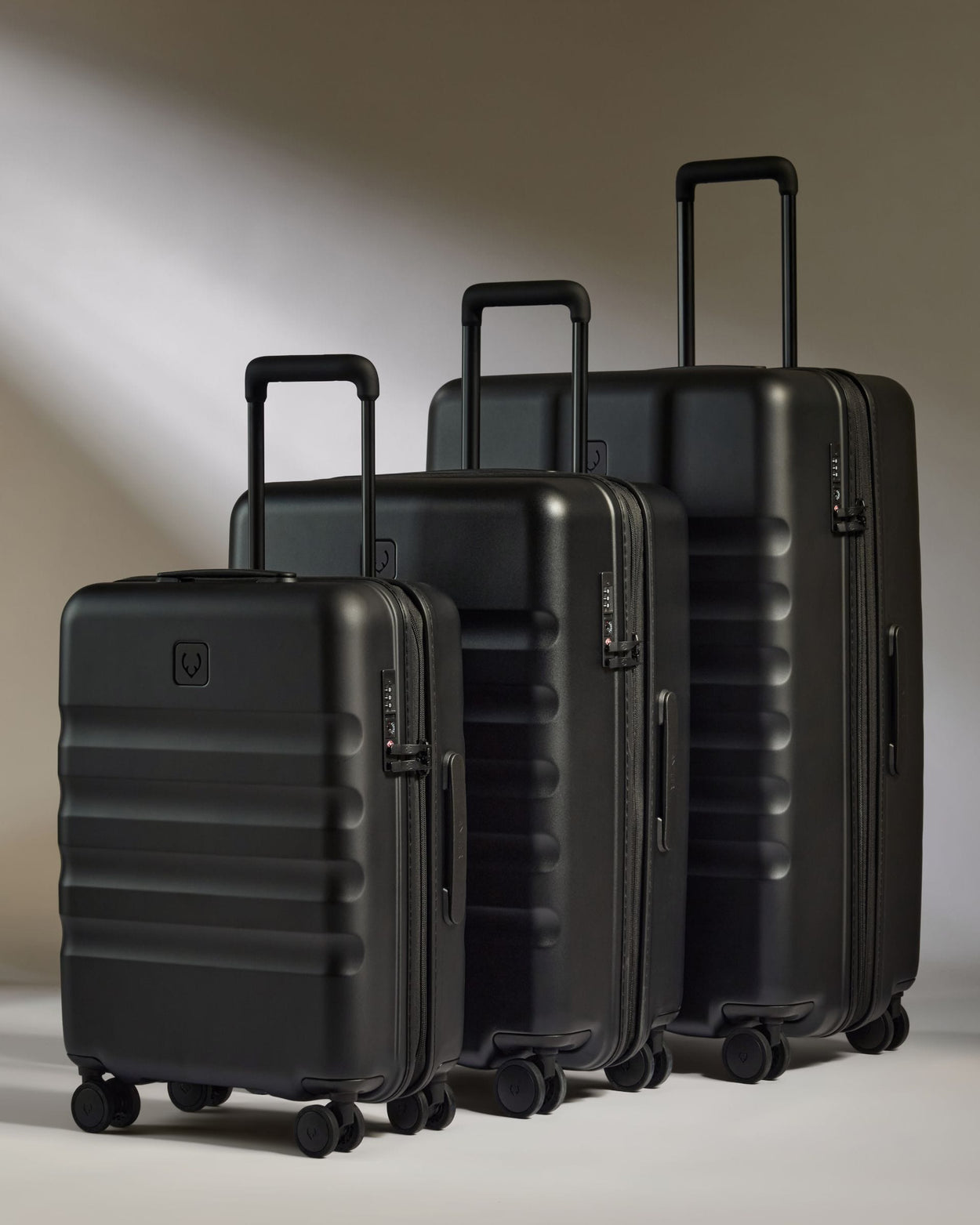 Cabin with Pocket Suitcase in Black - Icon Stripe | Hard Suitcase ...
